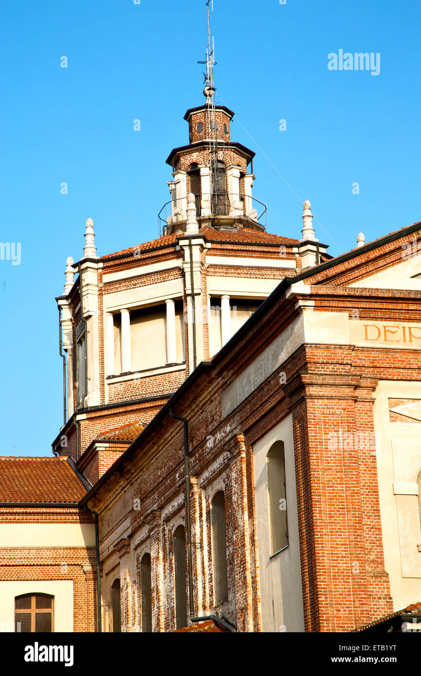 italy lombardy in the parabiago old church closed brick tower wall rose ...