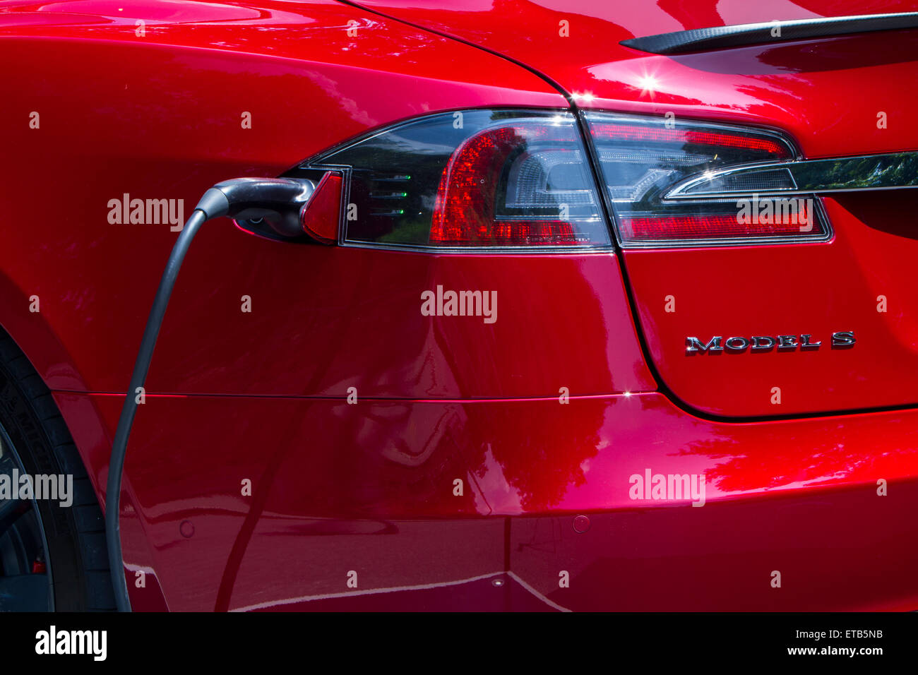 Turin, Italy, 11th June 2015. A Tesla Model S charging. Parco Valentino ...