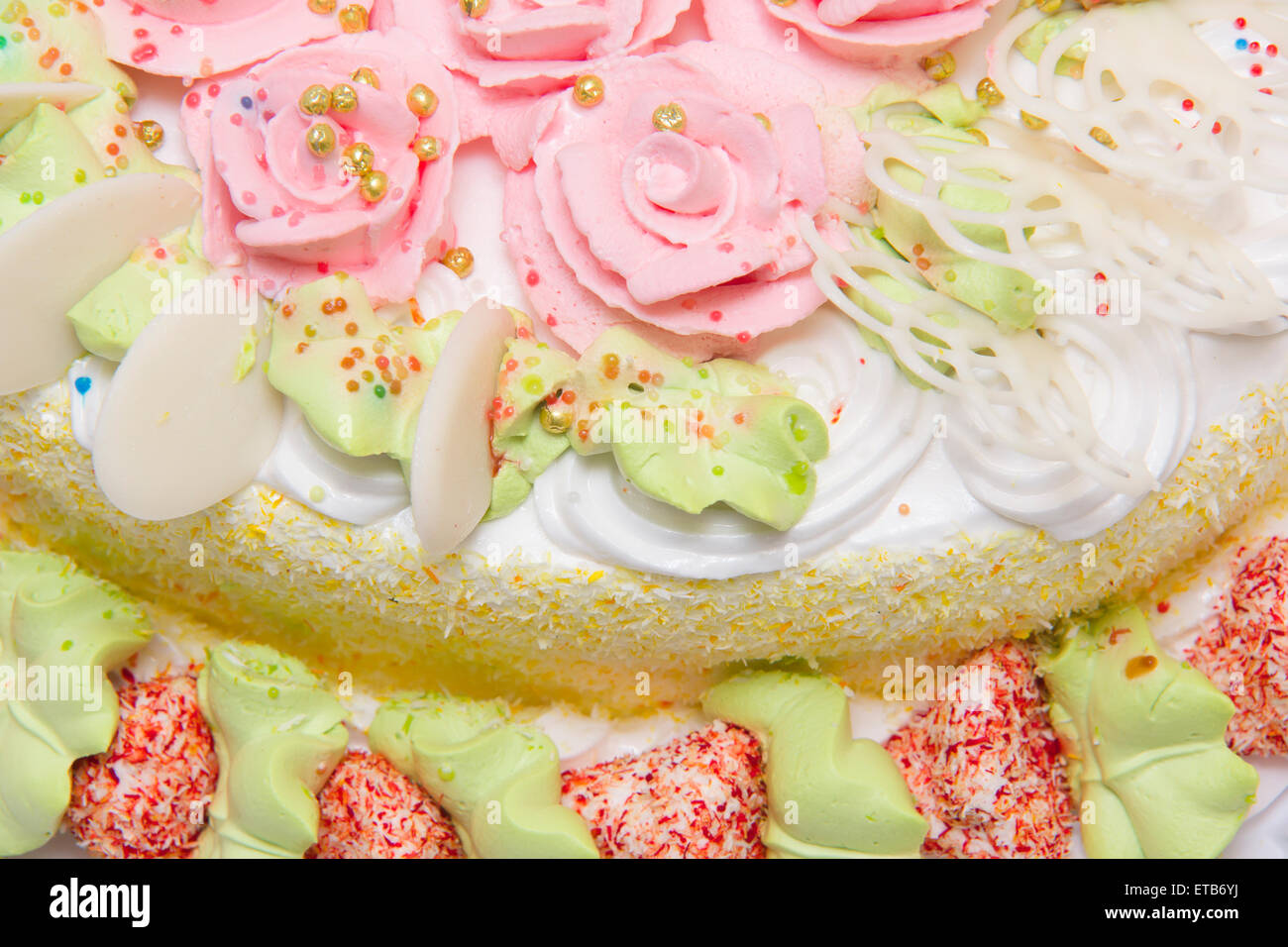 the big sweet pie decorated with cream roses on white background Stock ...