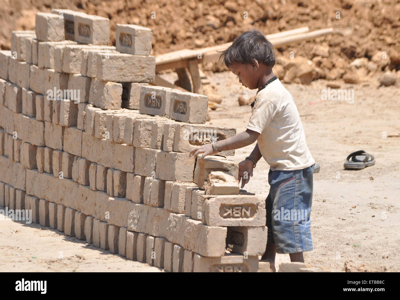 India. 11th June, 2015. An Indian child, Rahul (5 years old), plays ...