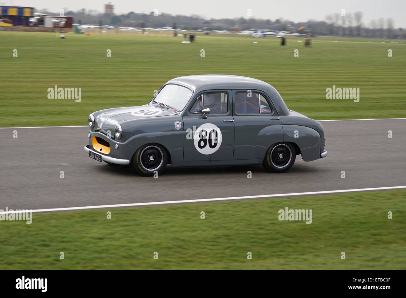 Peter Clements in a 1955 Standard Ten at the Goodwood Members Meeting ...