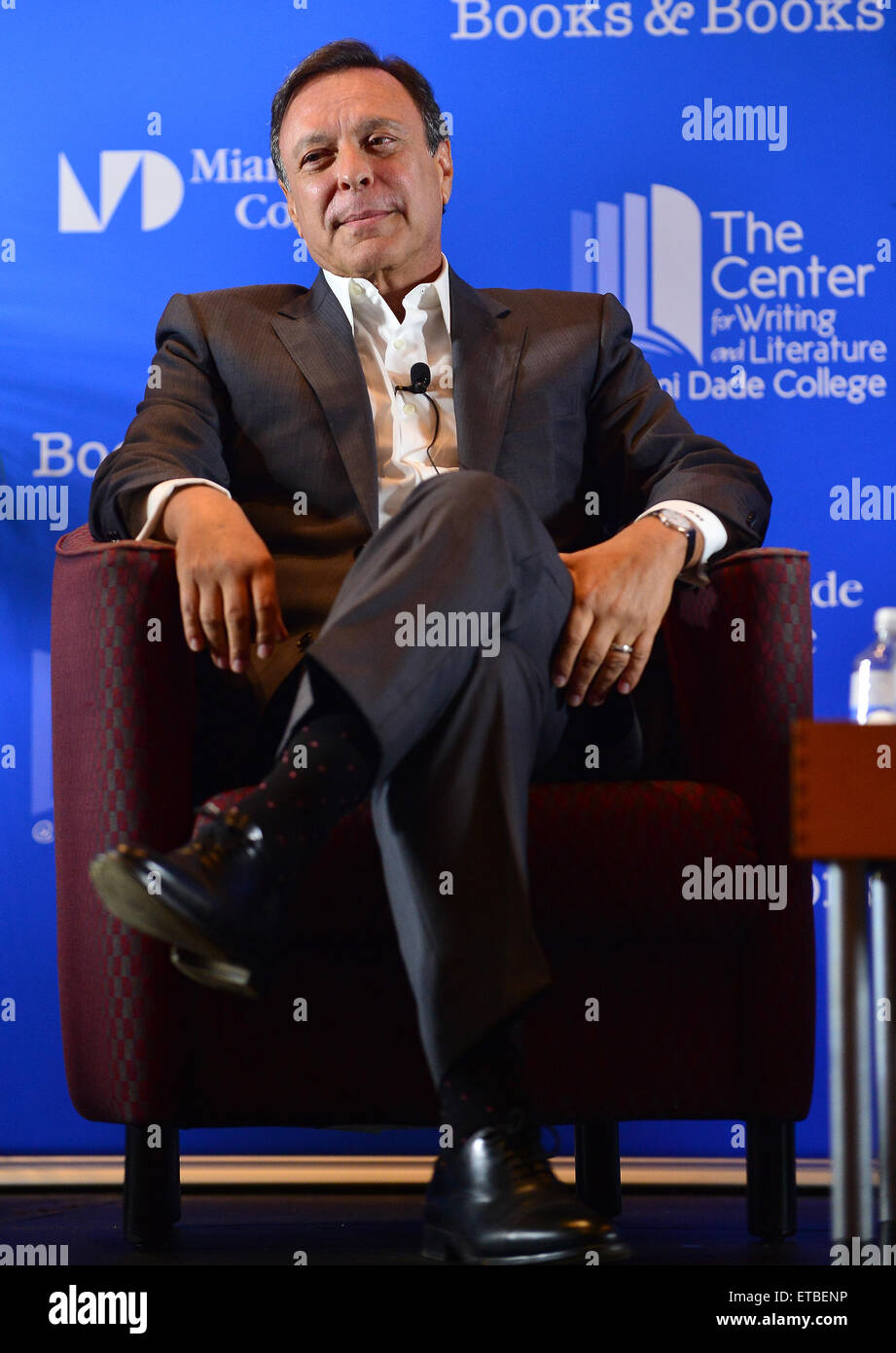 Mike Fernandez is joined by NBA legend Magic Johnson at a presentation ...