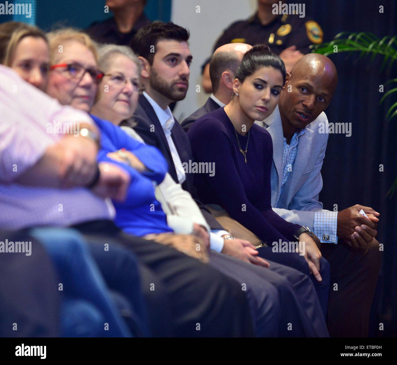 Mike Fernandez is joined by NBA legend Magic Johnson at a presentation ...