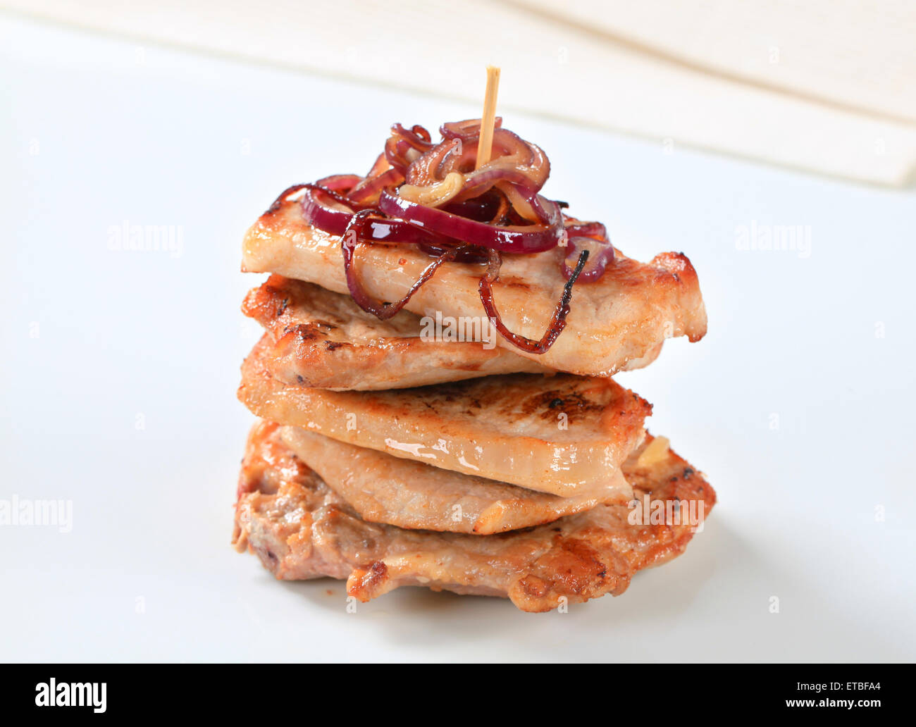 Stack of pan fried pork cutlets Stock Photo - Alamy