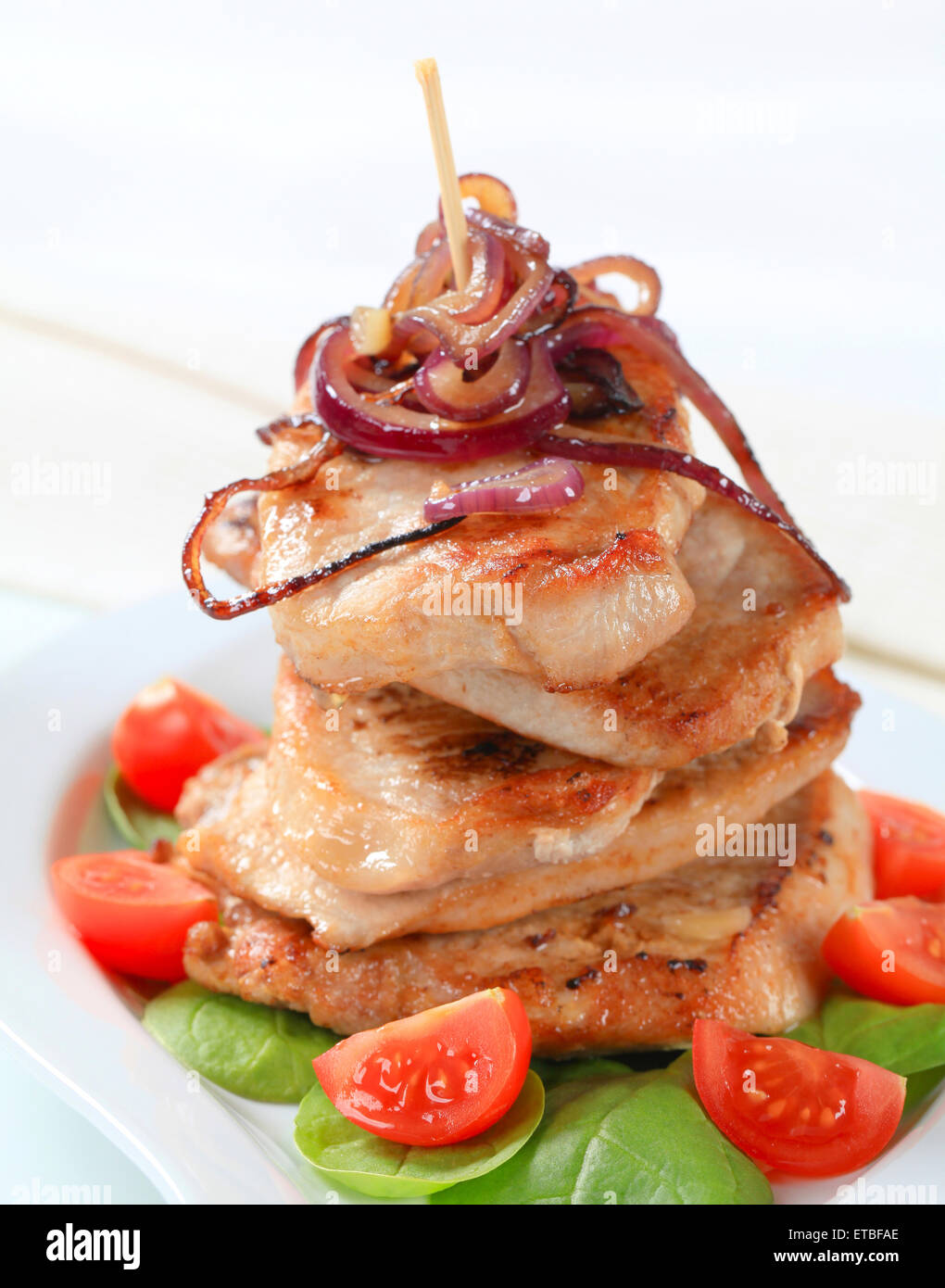 Stack of pan fried pork cutlets Stock Photo - Alamy