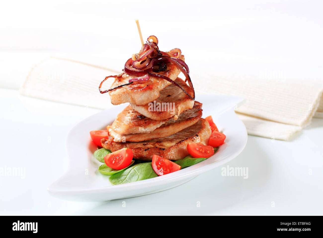 Stack of pan fried pork cutlets Stock Photo - Alamy