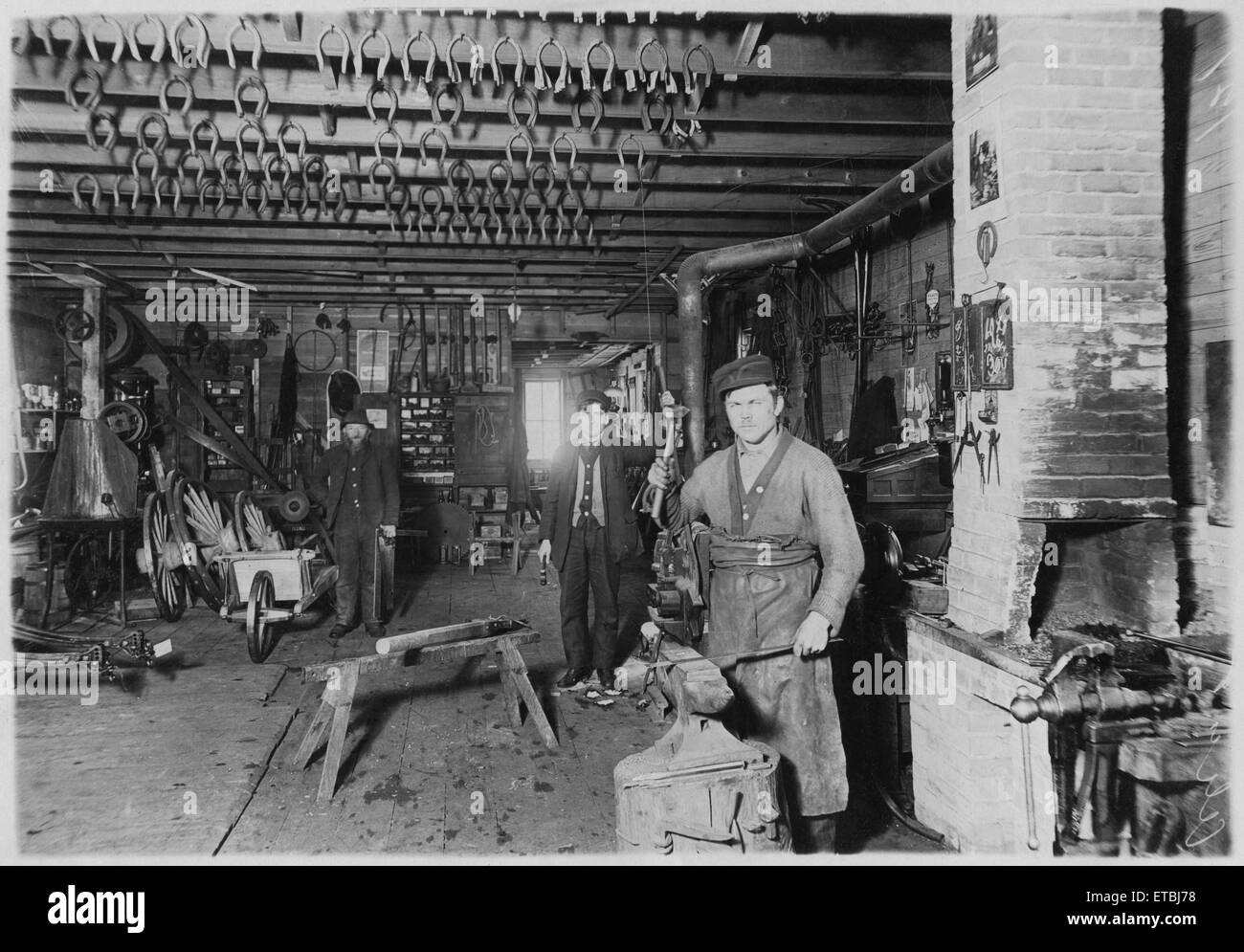 Blacksmith in Cartwright shop, circa 1890 Stock Photo - Alamy