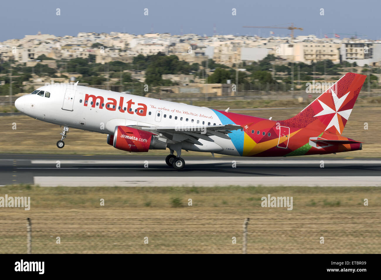Airmalta Airbus A319 taking off from runway 13 in Malta Stock Photo - Alamy