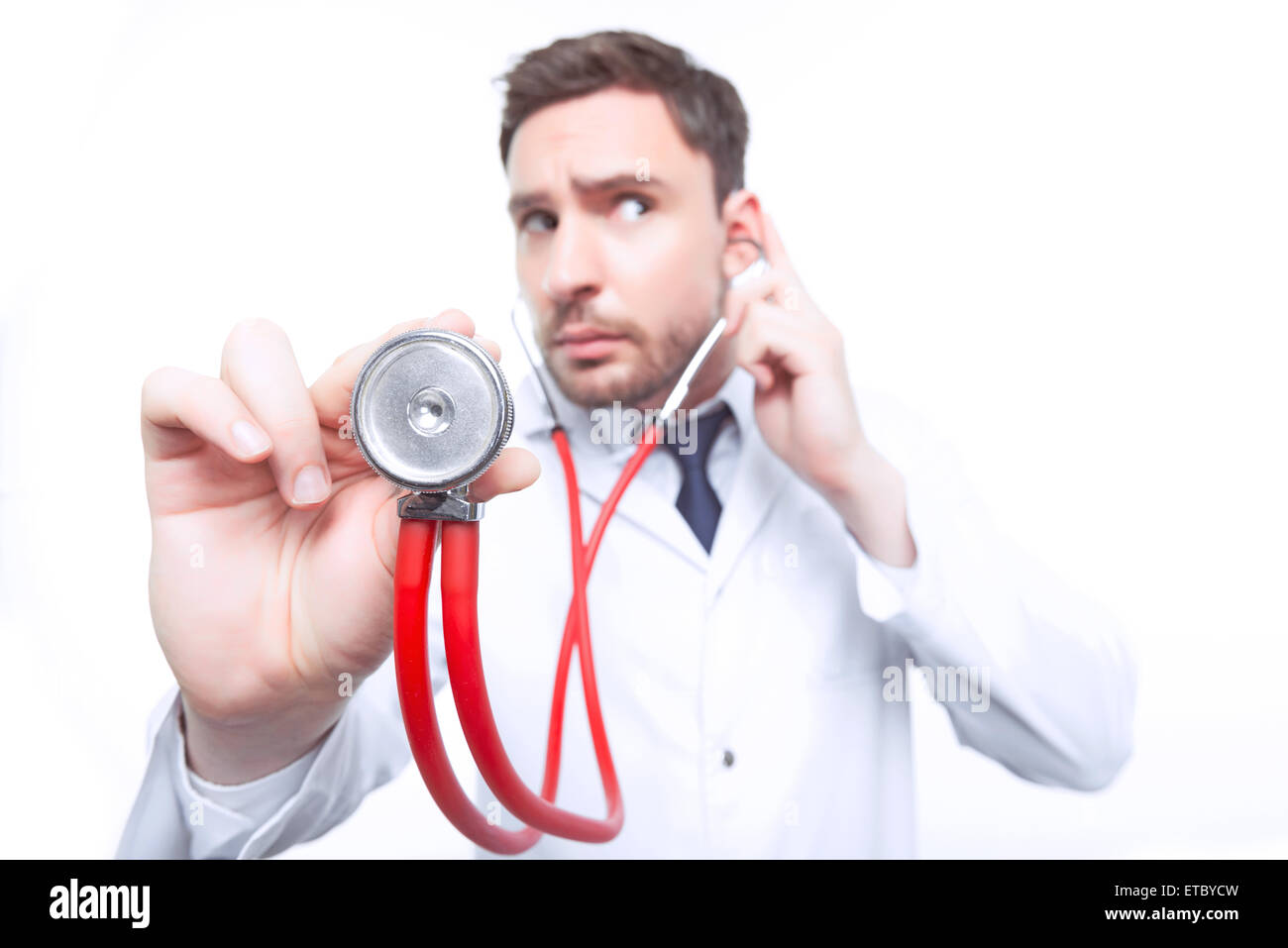 Professional cardiologist holding stethoscope Stock Photo - Alamy
