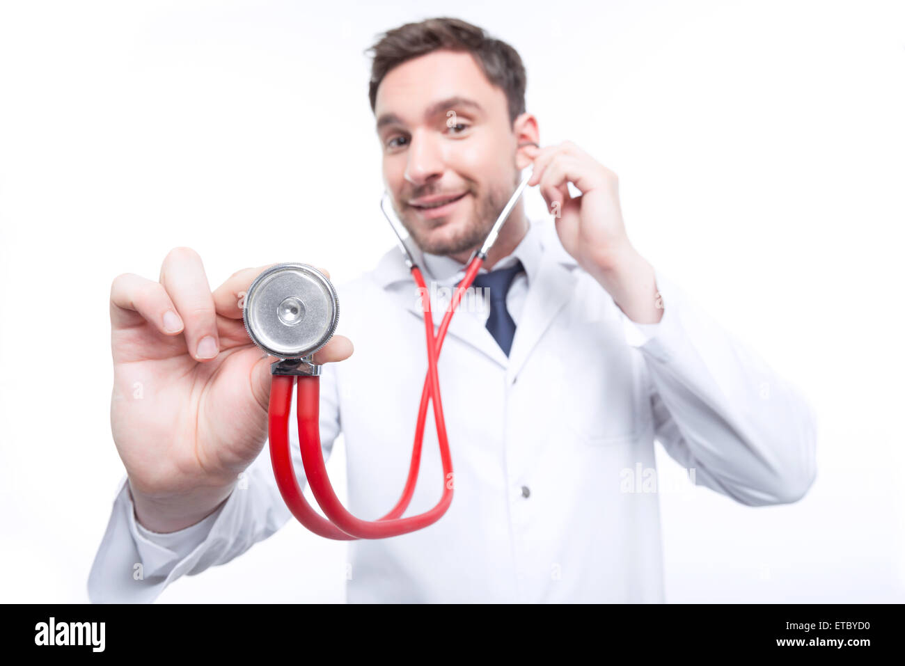 Professional cardiologist holding stethoscope Stock Photo - Alamy