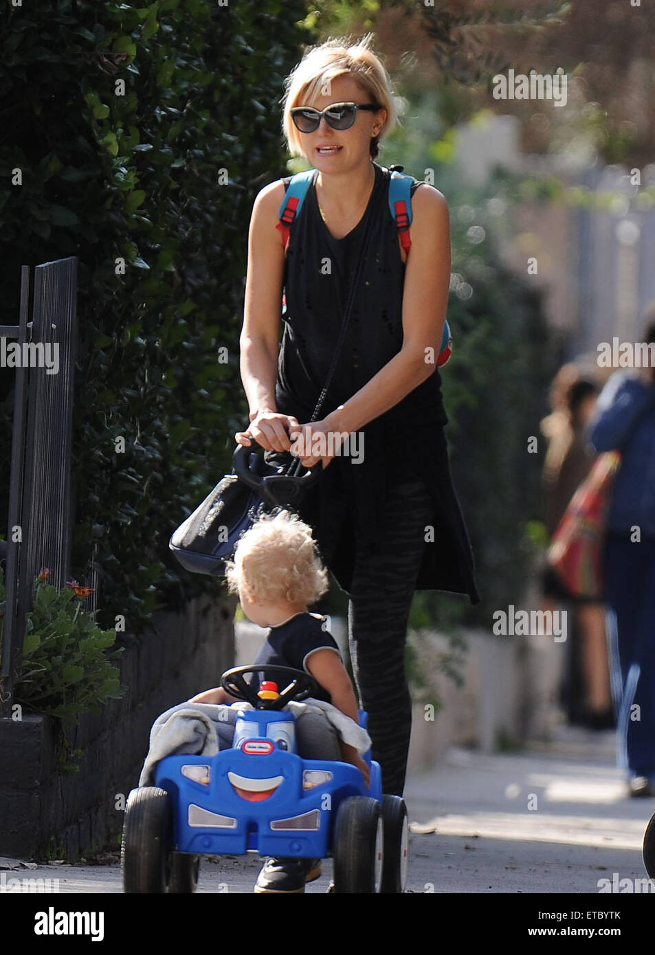 Malin Åkerman takes her son, Sebastian, out in his push buggy in Los ...