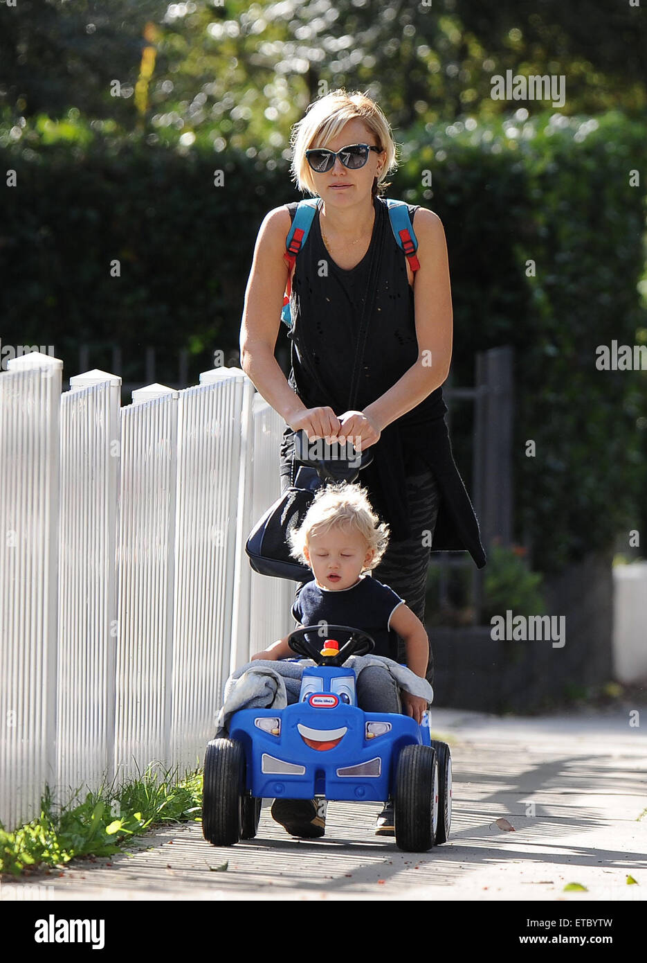 Malin Åkerman takes her son, Sebastian, out in his push buggy in Los ...
