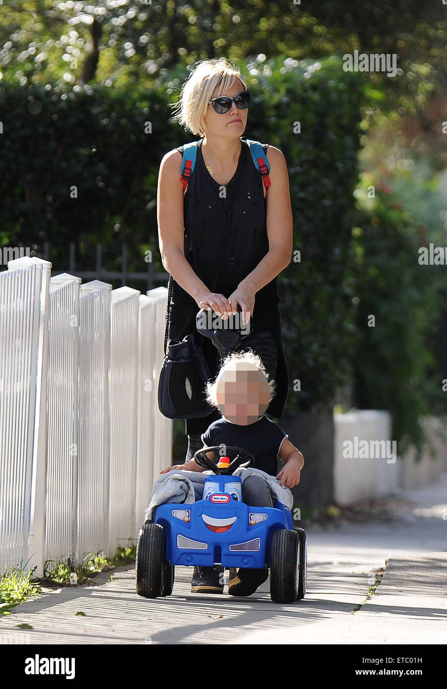 Malin Åkerman takes her son, Sebastian, out in his push buggy in Los ...