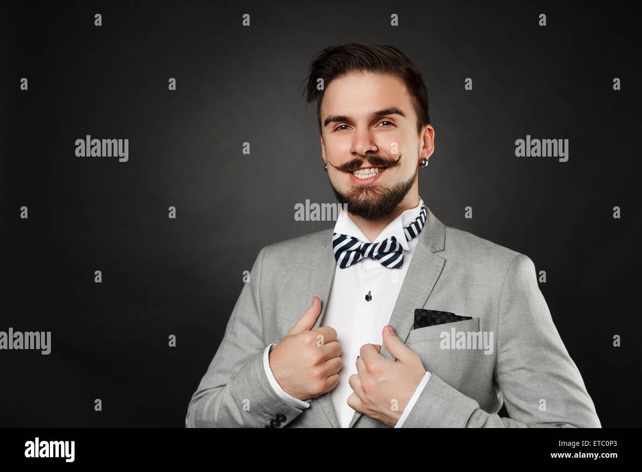 Bearded guy in black suit hi-res stock photography and images - Alamy