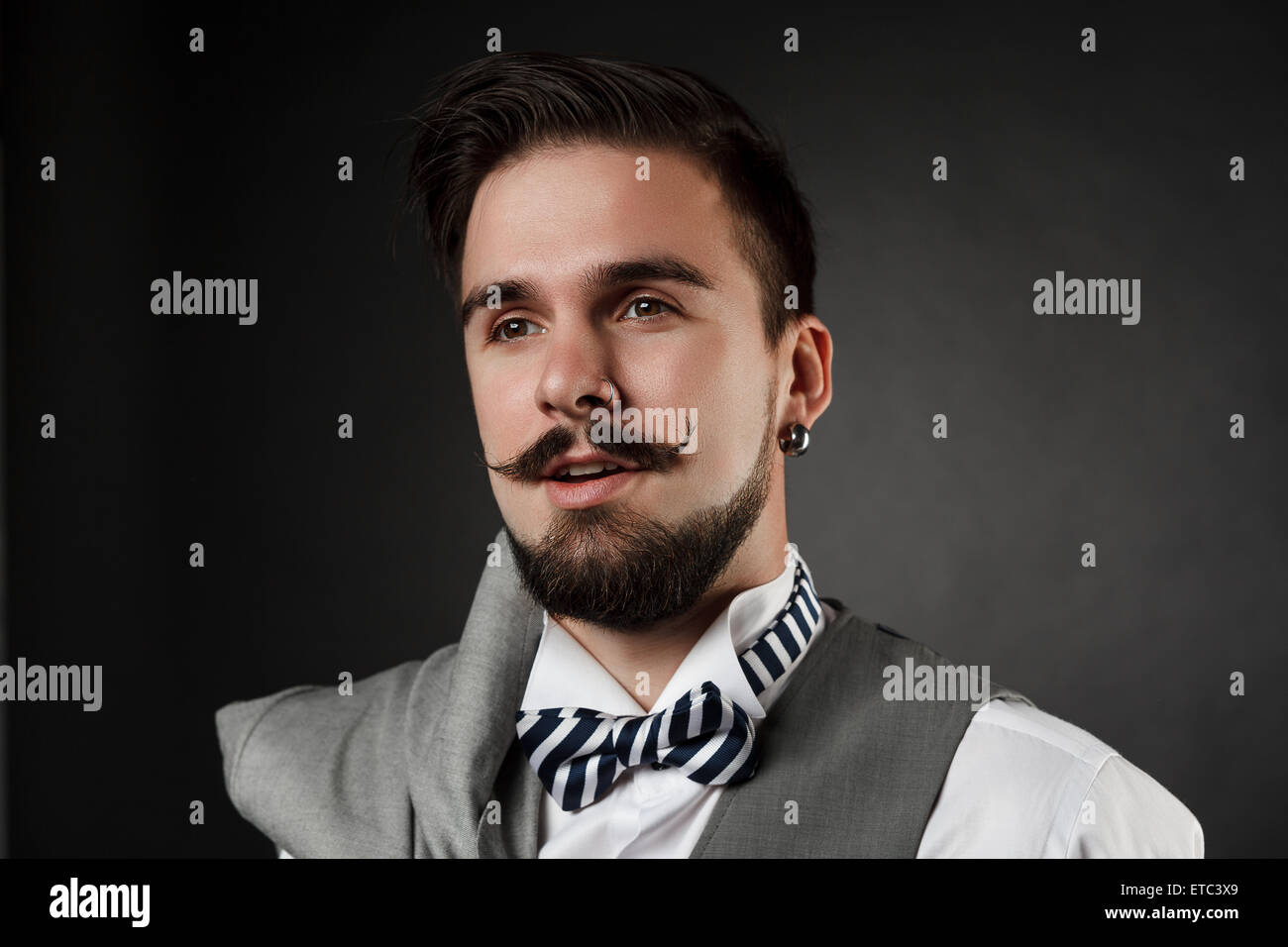 handsome guy with beard and mustache in suit Stock Photo - Alamy