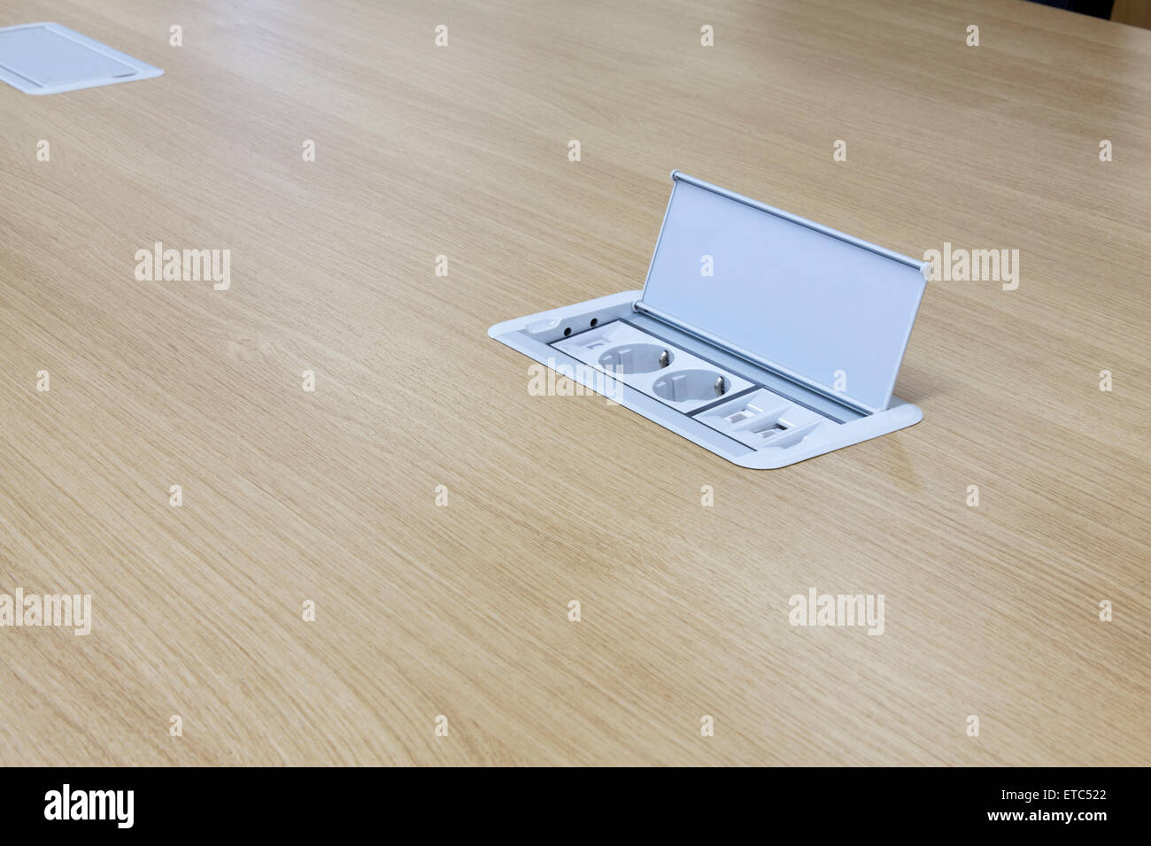 detail on conference table with multifunctional socket Stock Photo - Alamy