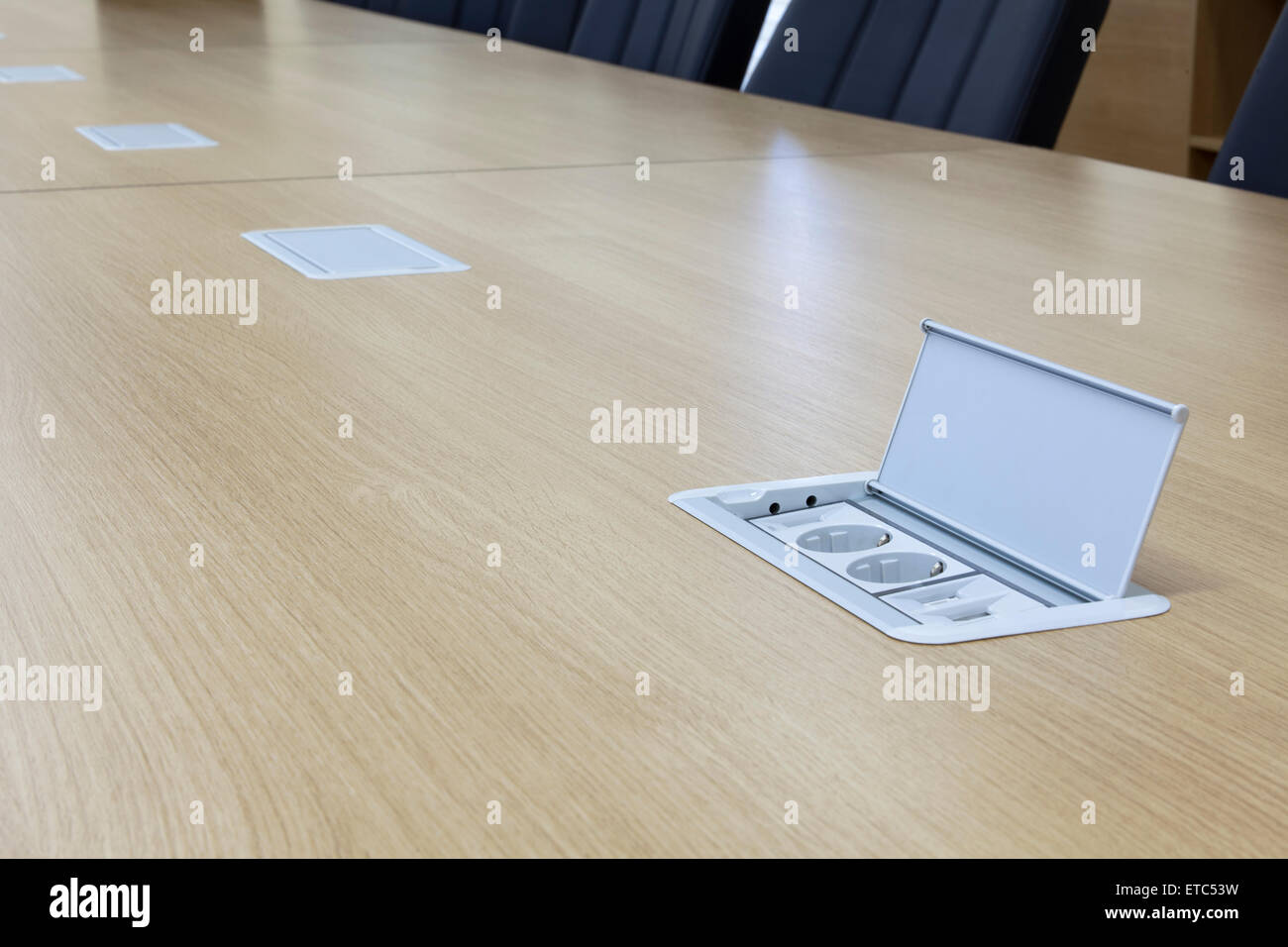 detail on conference table with multifunctional socket Stock Photo - Alamy