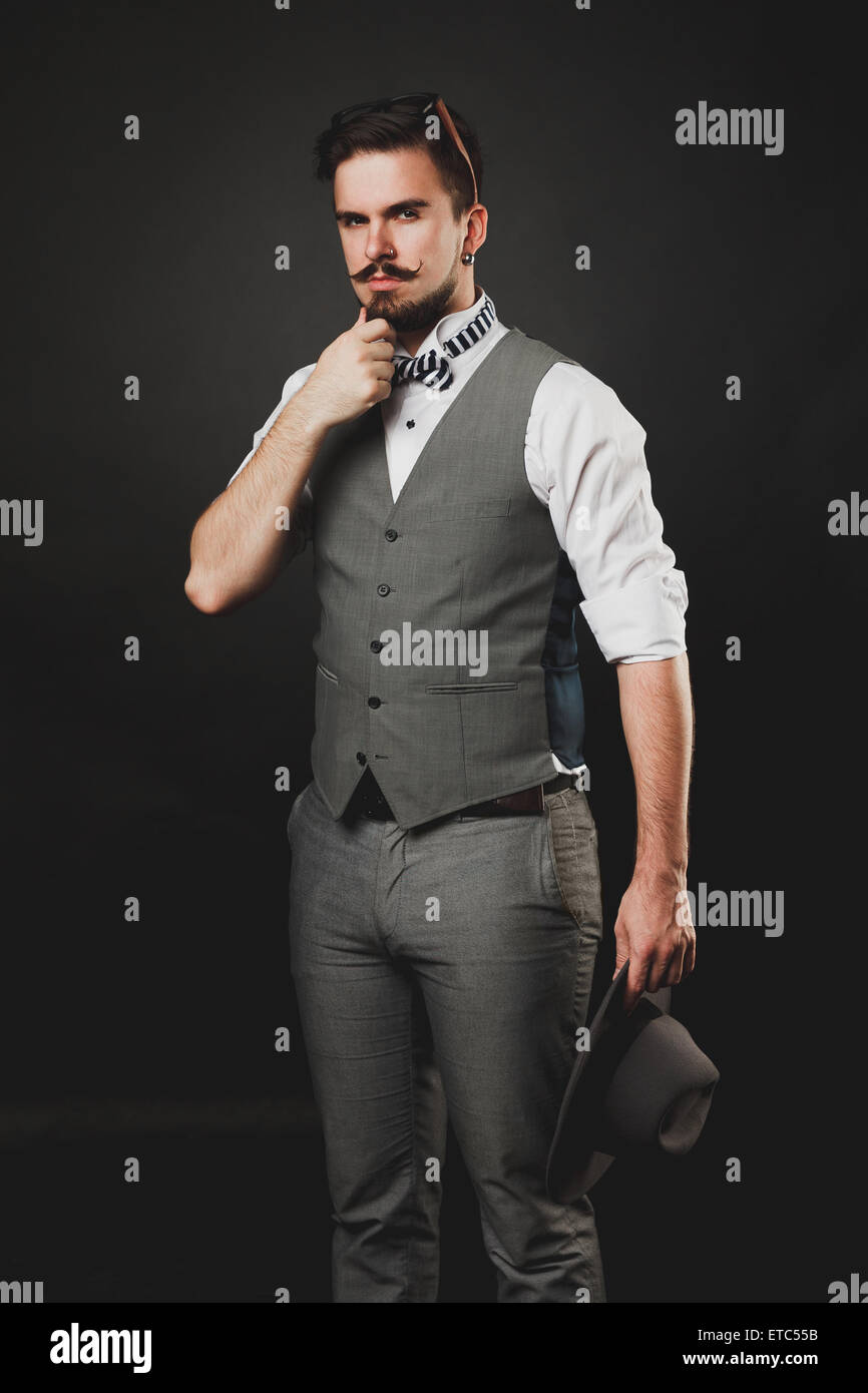 handsome guy with beard and mustache in suit Stock Photo - Alamy
