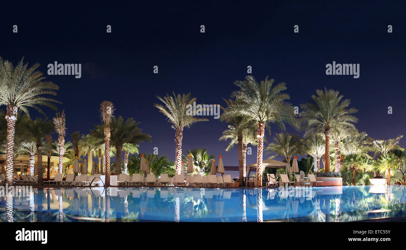 resort and luxury getaway hotel view of water swimming pool at night ...