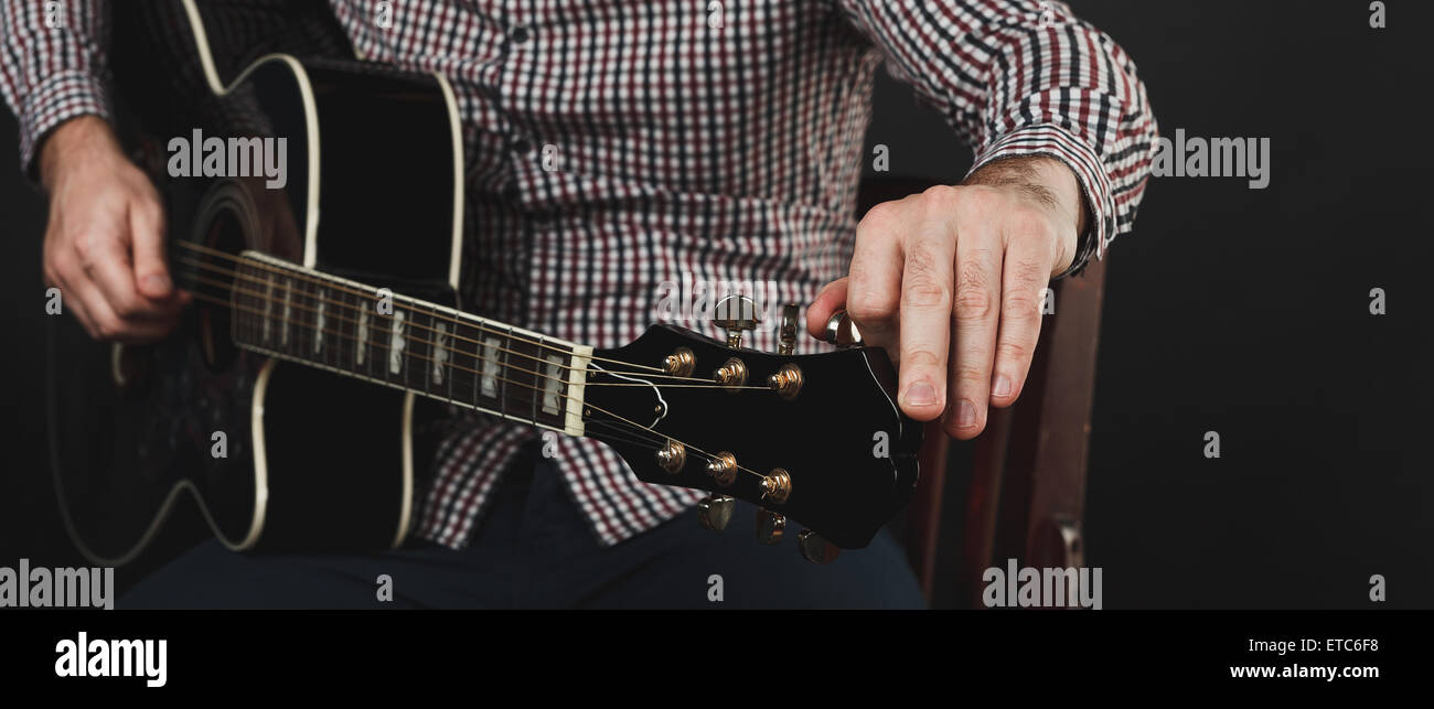 acoustic guitar tuning and playing close up Stock Photo - Alamy