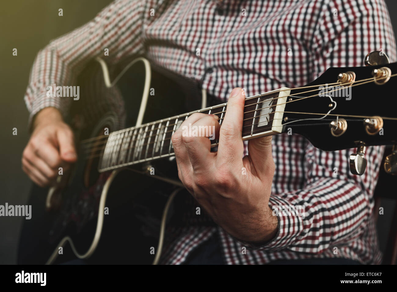 acoustic guitar tuning and playing close up Stock Photo - Alamy