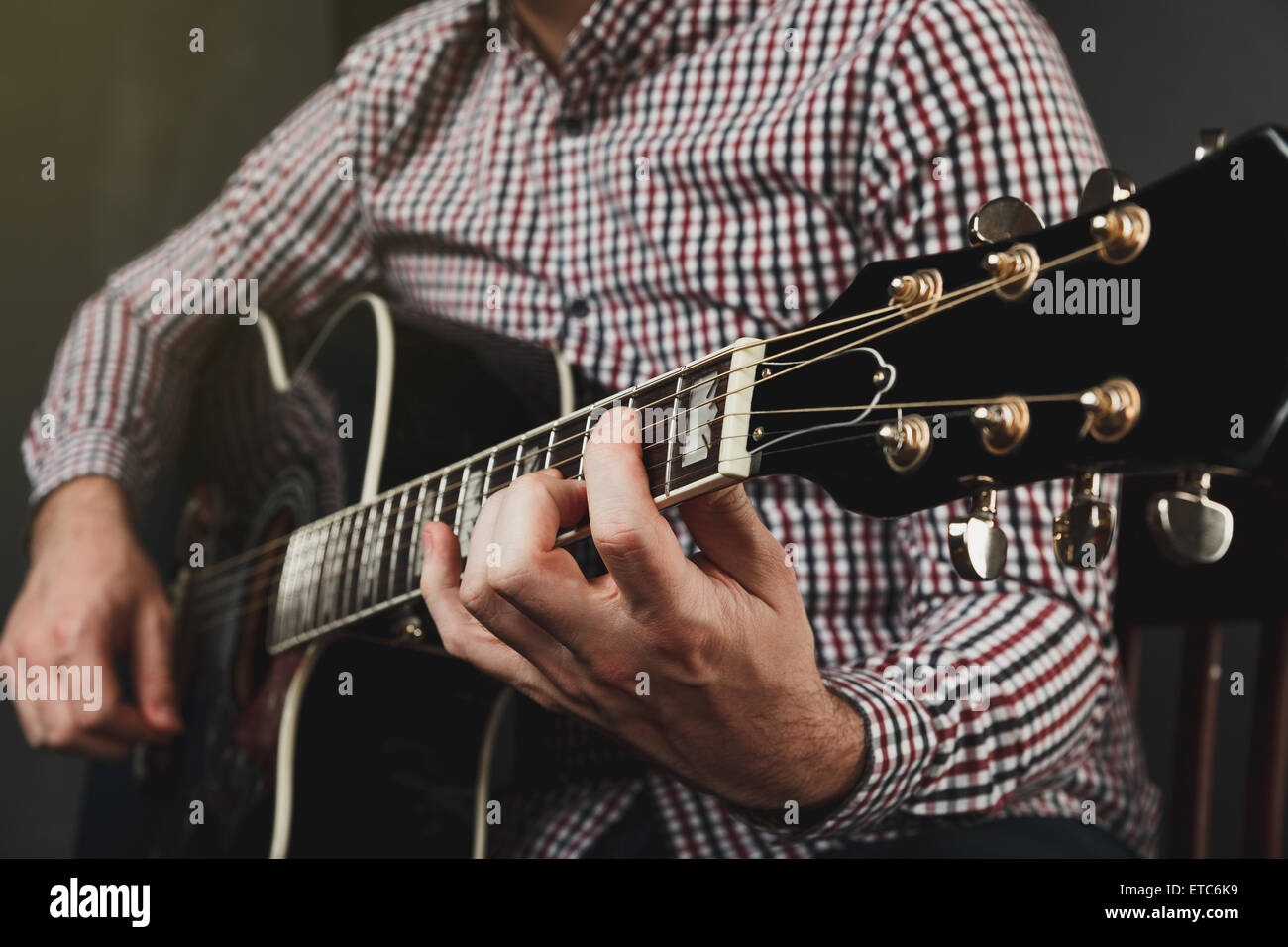 acoustic guitar tuning and playing close up Stock Photo - Alamy