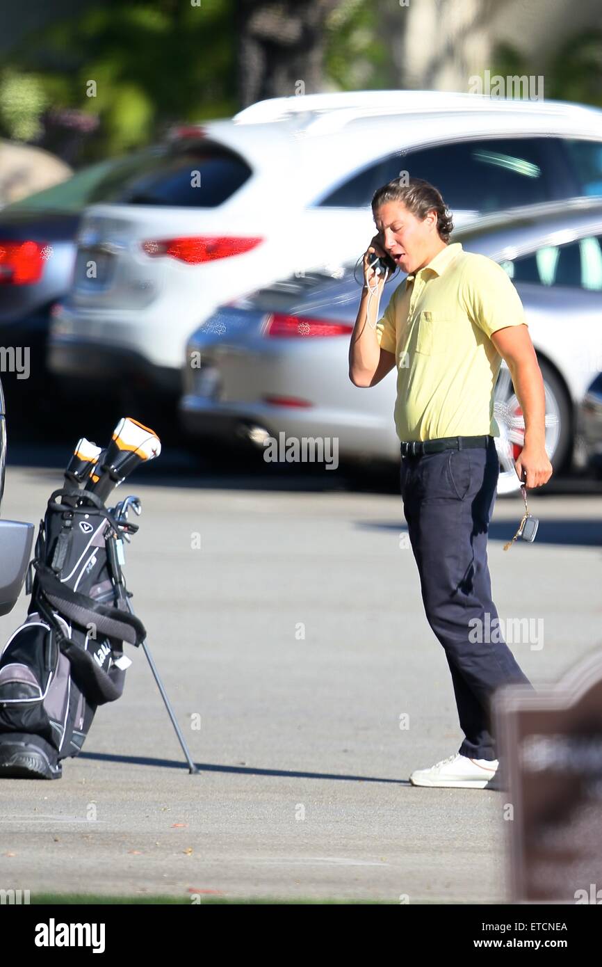 Vito Schnabel seen making a phone call before going to play golf on his ...