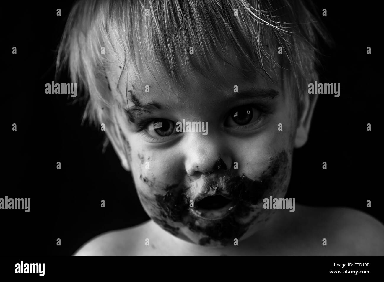 Boy eating chocolate messy hi-res stock photography and images - Alamy