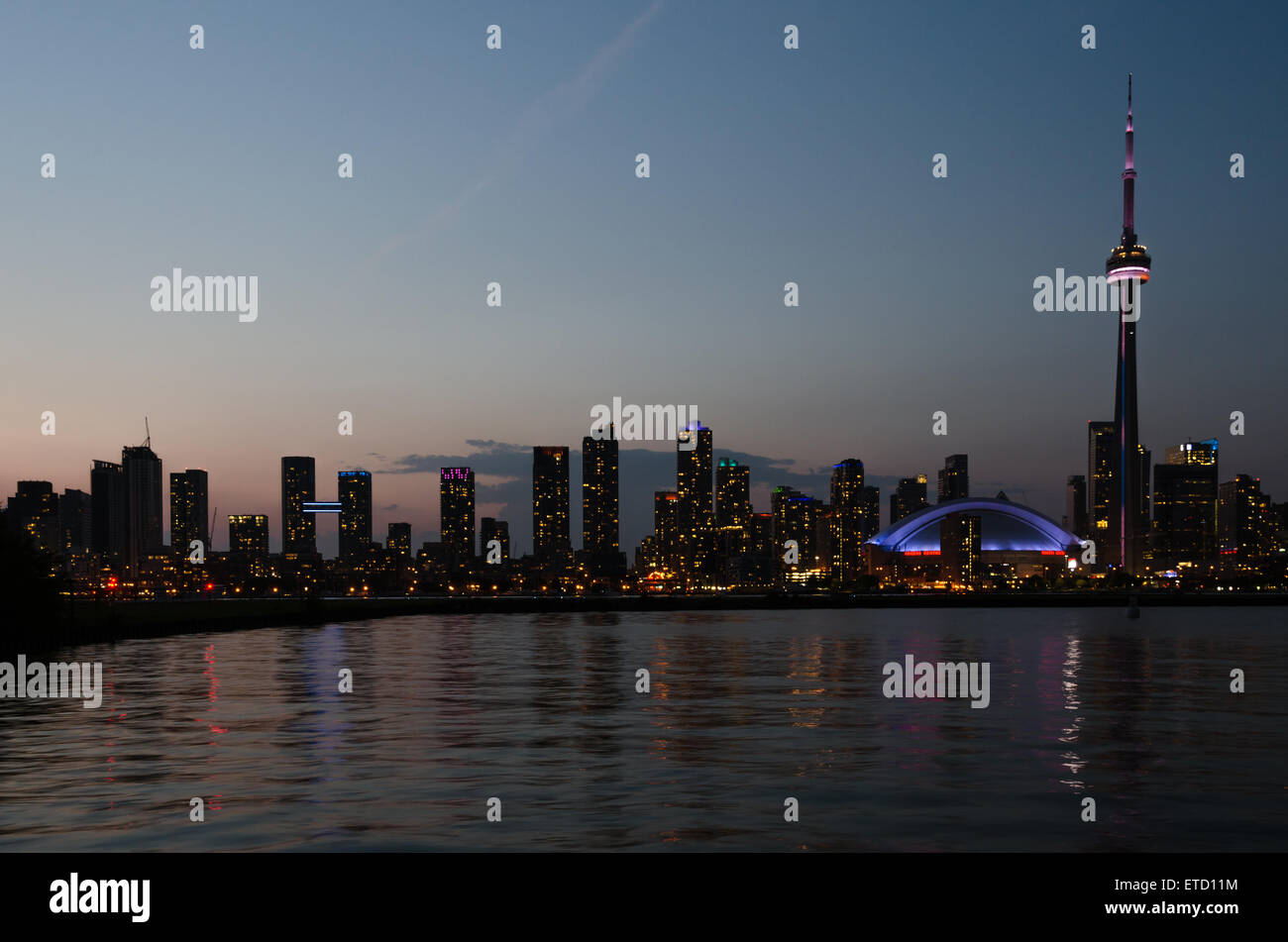 Skyline of Toronto over Ontario Lake after sunset Stock Photo - Alamy