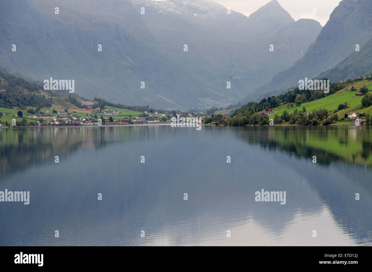 Reflection in Norway fjord at fall time Stock Photo - Alamy