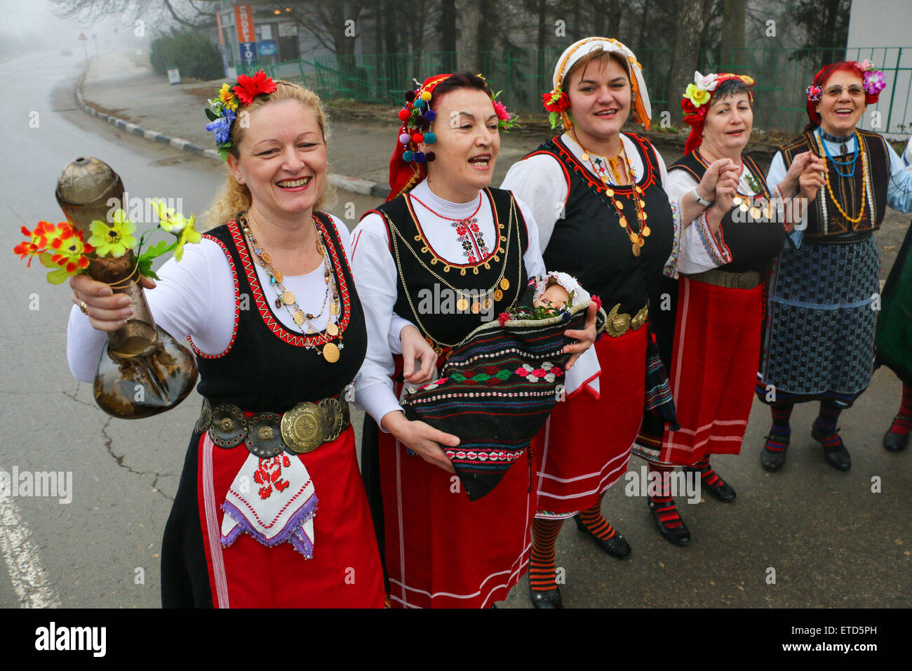Bulgarian women dress up for a carnival in celebration of Midwife Day ...