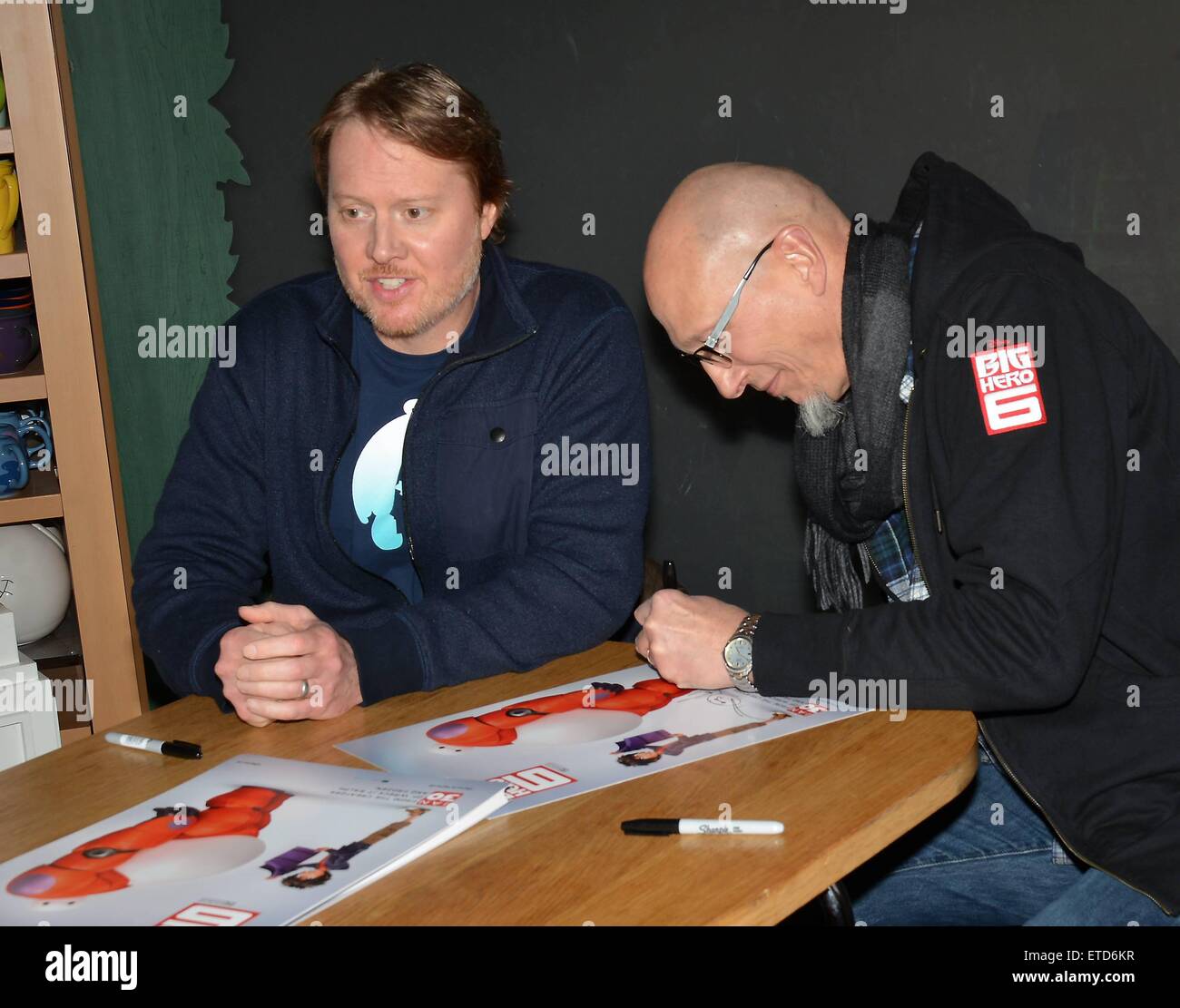 Big Hero 6 director Don Hall & producer Roy Conli at a signing for the ...