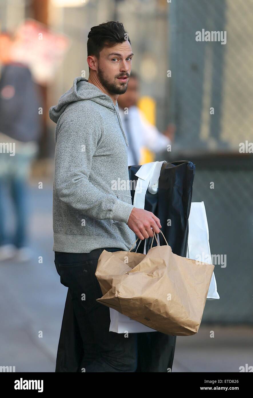 Mathew Paetz seen arriving at the ABC studios carrying clothing bags ...