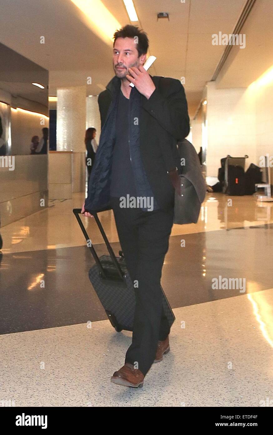 Keanu Reeves departs from Los Angeles International Airport (LAX ...
