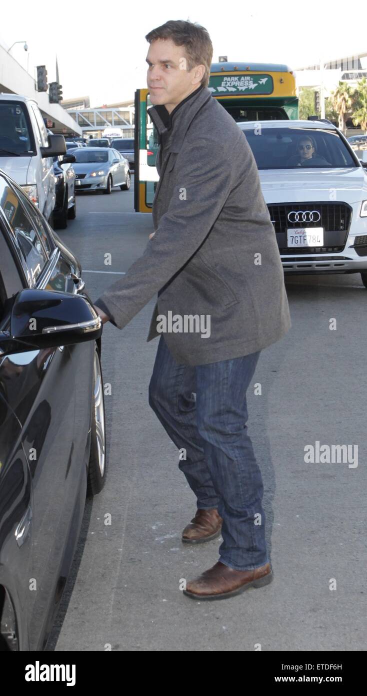 Former professional ice hockey player, Luc Robitaille departs from LAX ...