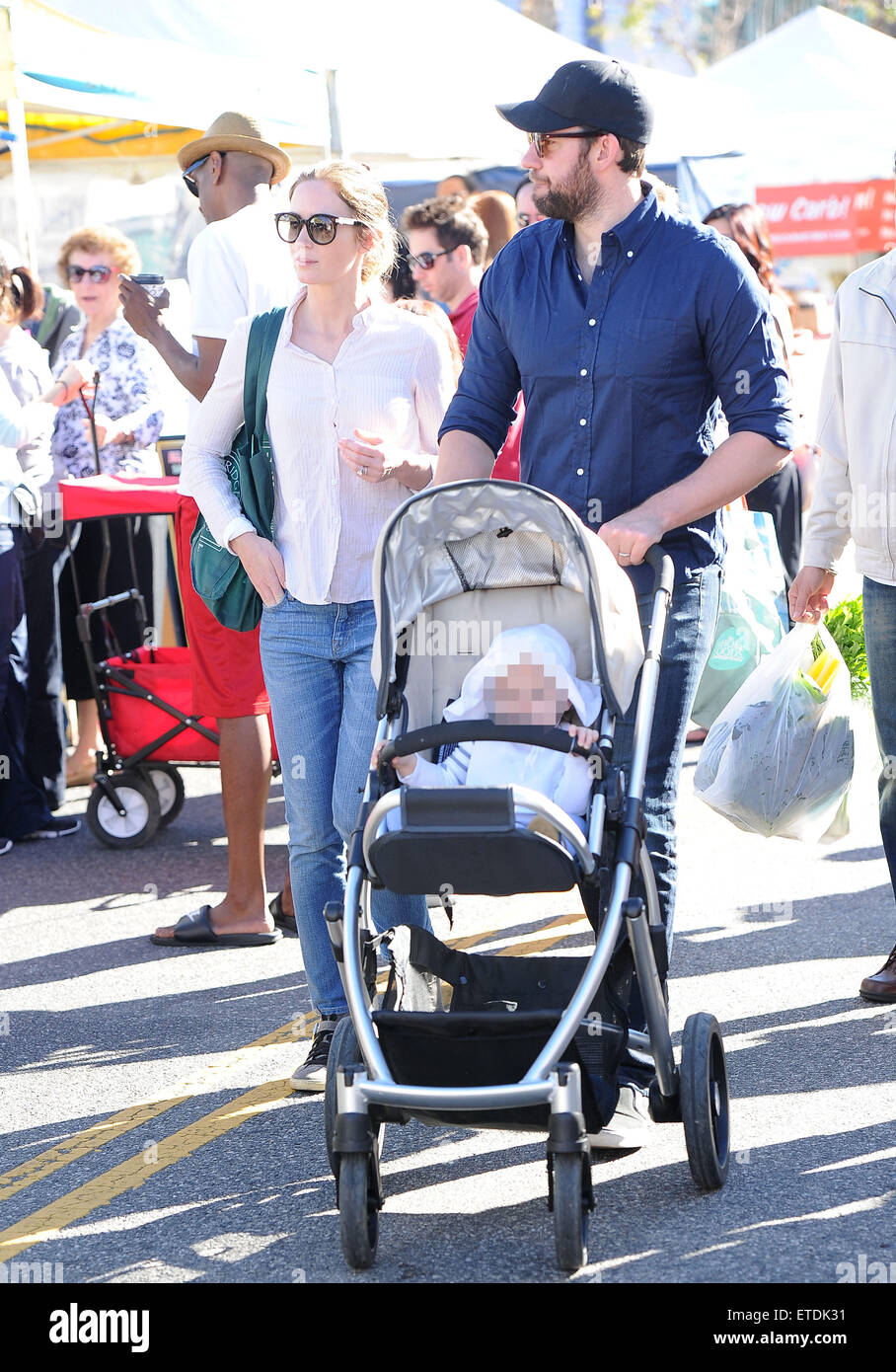Emily Blunt and Jon Krasinski take their baby daughter, Hazel to the ...