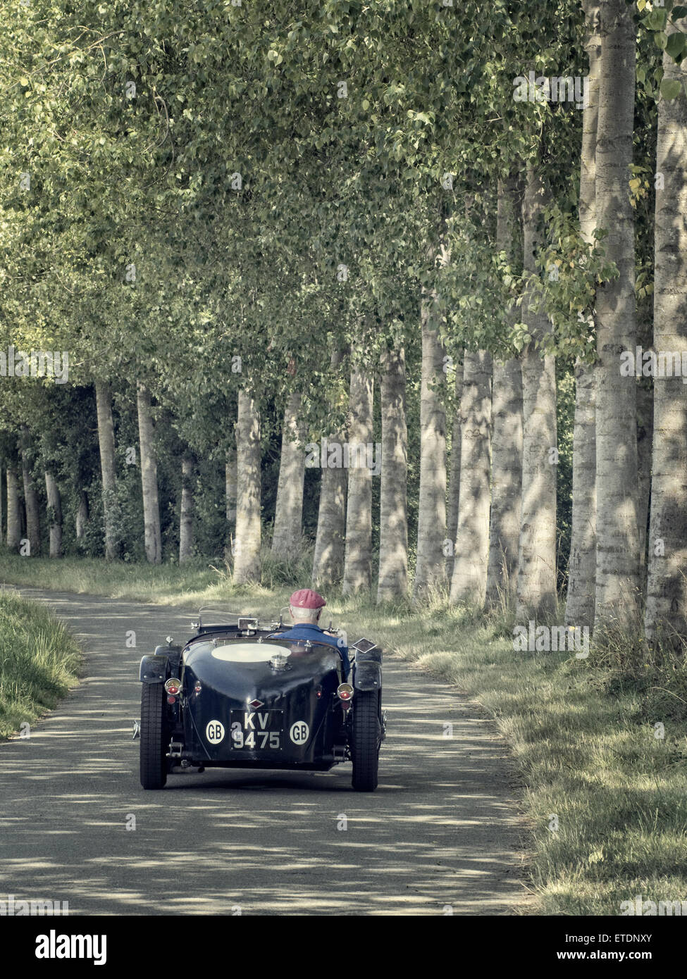 1934 Riley Ulster Imp driving on a French country road Stock Photo - Alamy