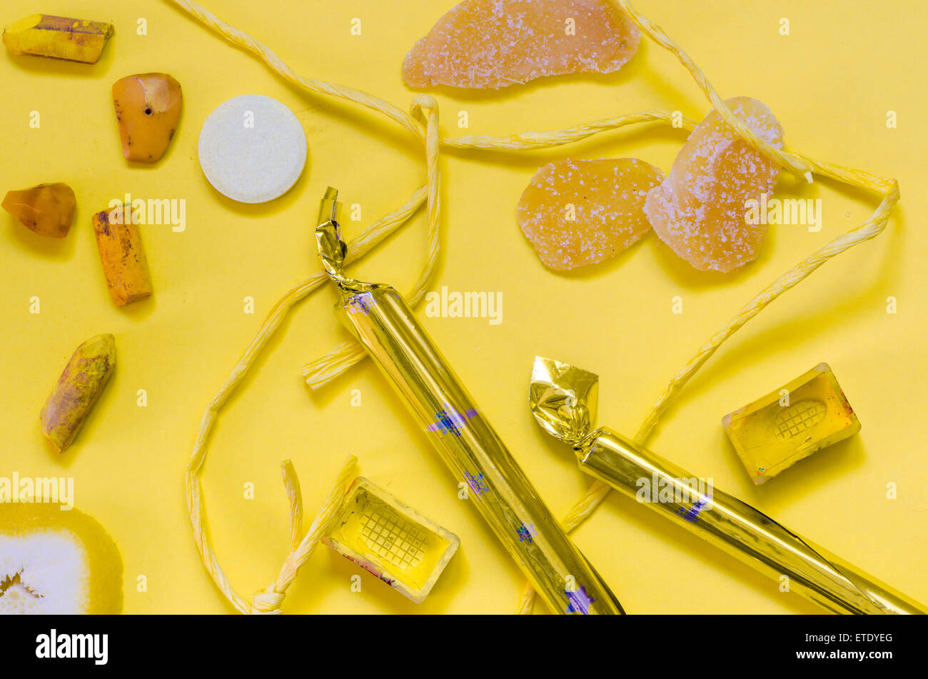 group of yellow objects on yellow background Stock Photo - Alamy