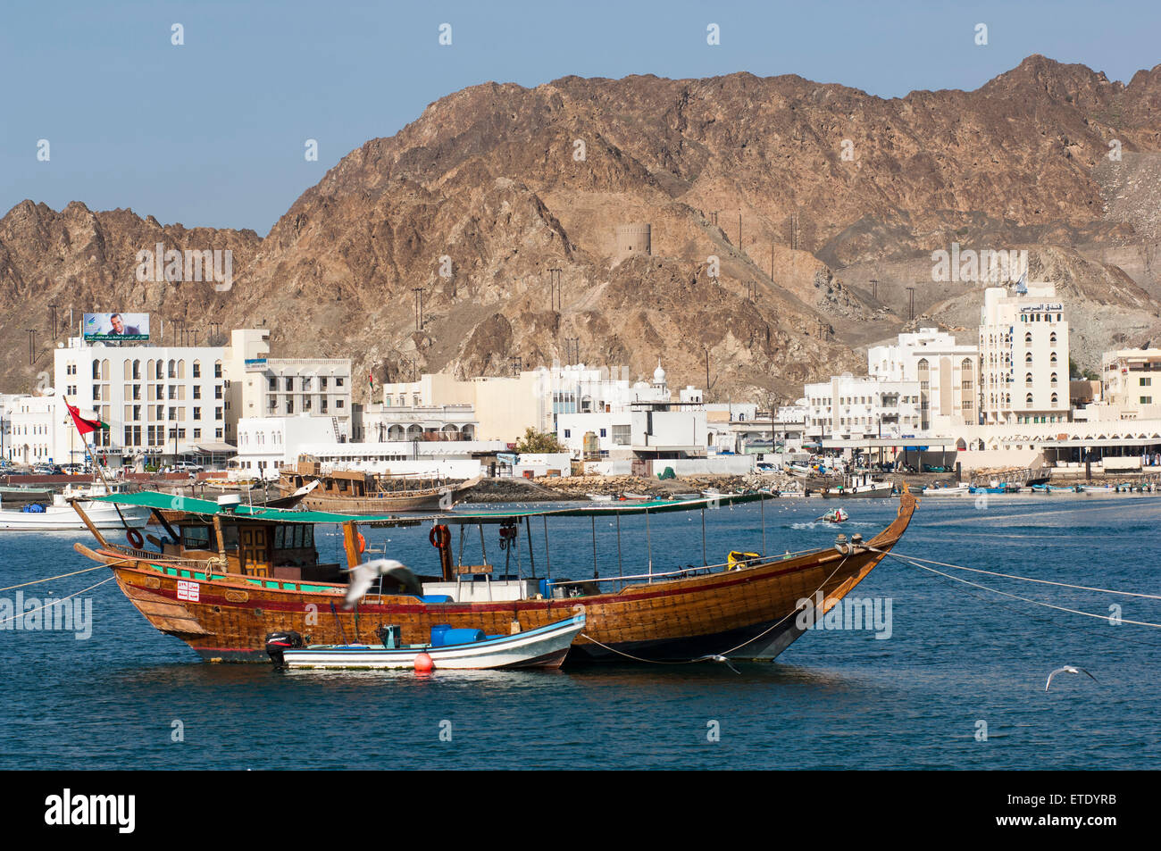 A tourist boat moored in the harbour of Muscat, Oman Stock Photo - Alamy