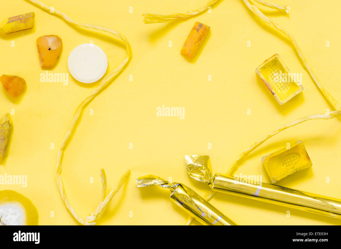 group of yellow objects on yellow background Stock Photo - Alamy