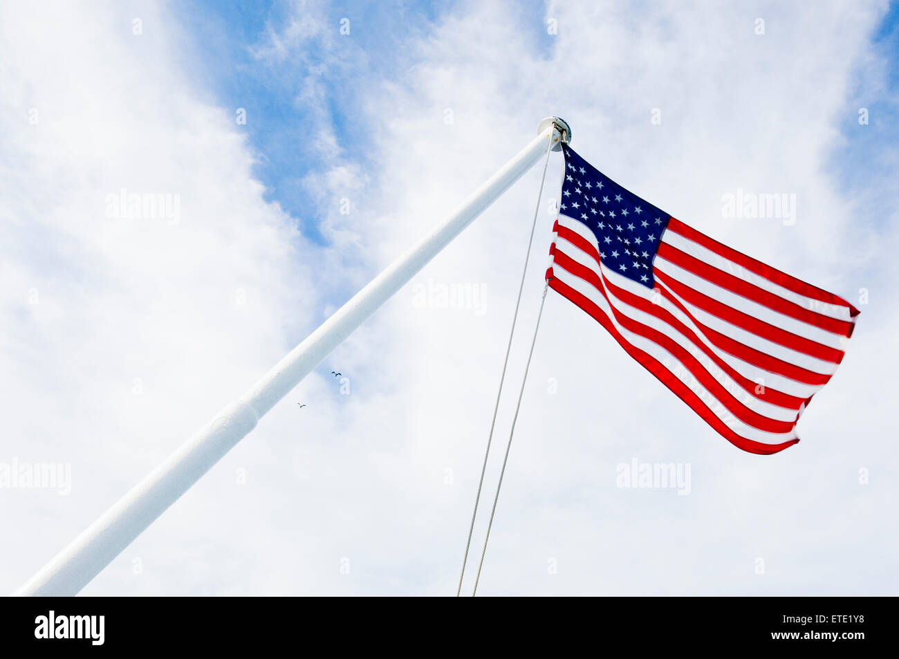 Flag flying flying flag hi-res stock photography and images - Alamy