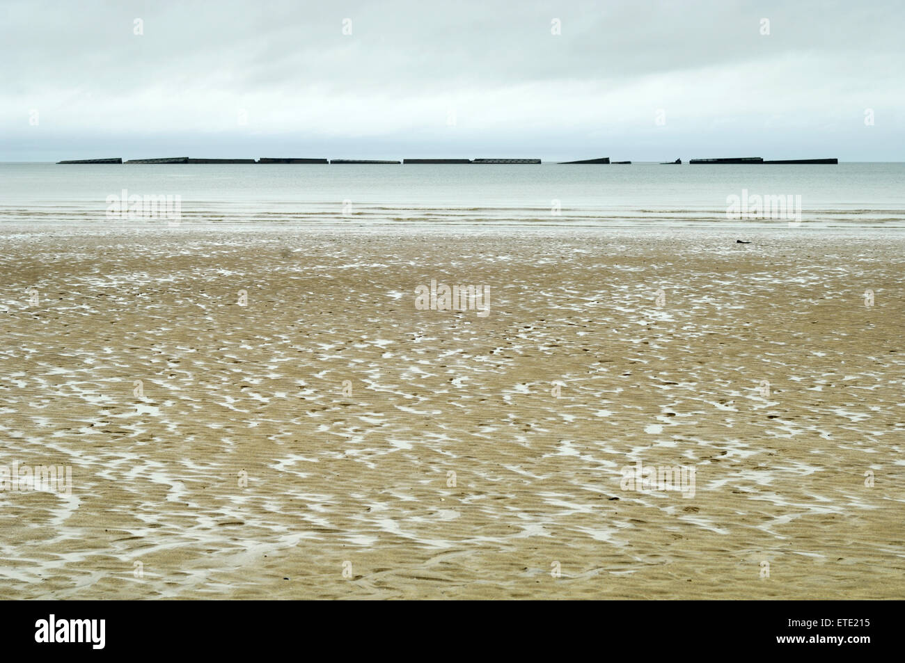 Remains of World War 2 Mulberry temporary harbour at Arromanches ...