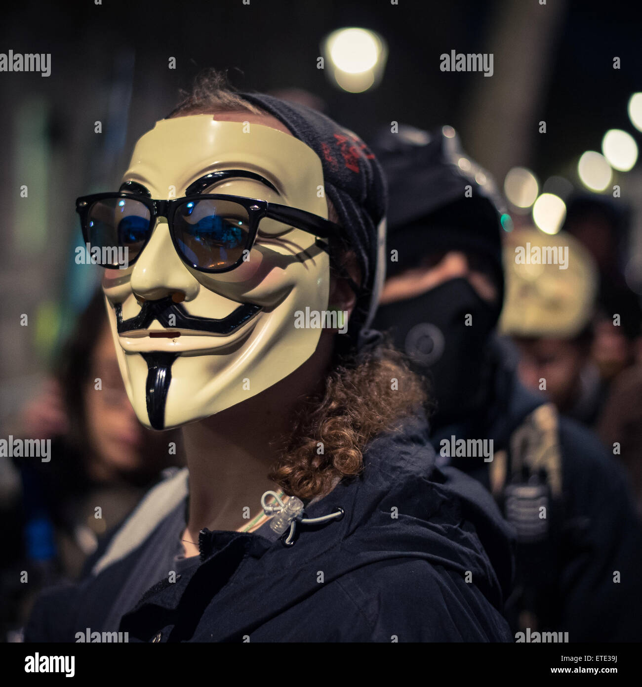 Protesters with anonymous mask hi-res stock photography and images - Alamy
