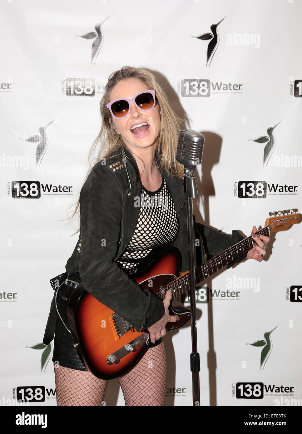 Pop singer and Fashion designer Nikki Lund at 138 Water photocall ...