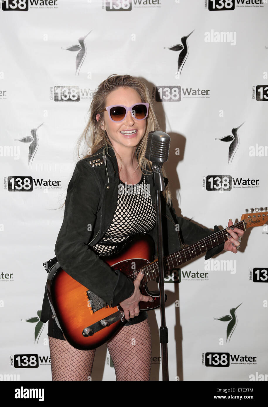 Pop singer and Fashion designer Nikki Lund at 138 Water photocall ...