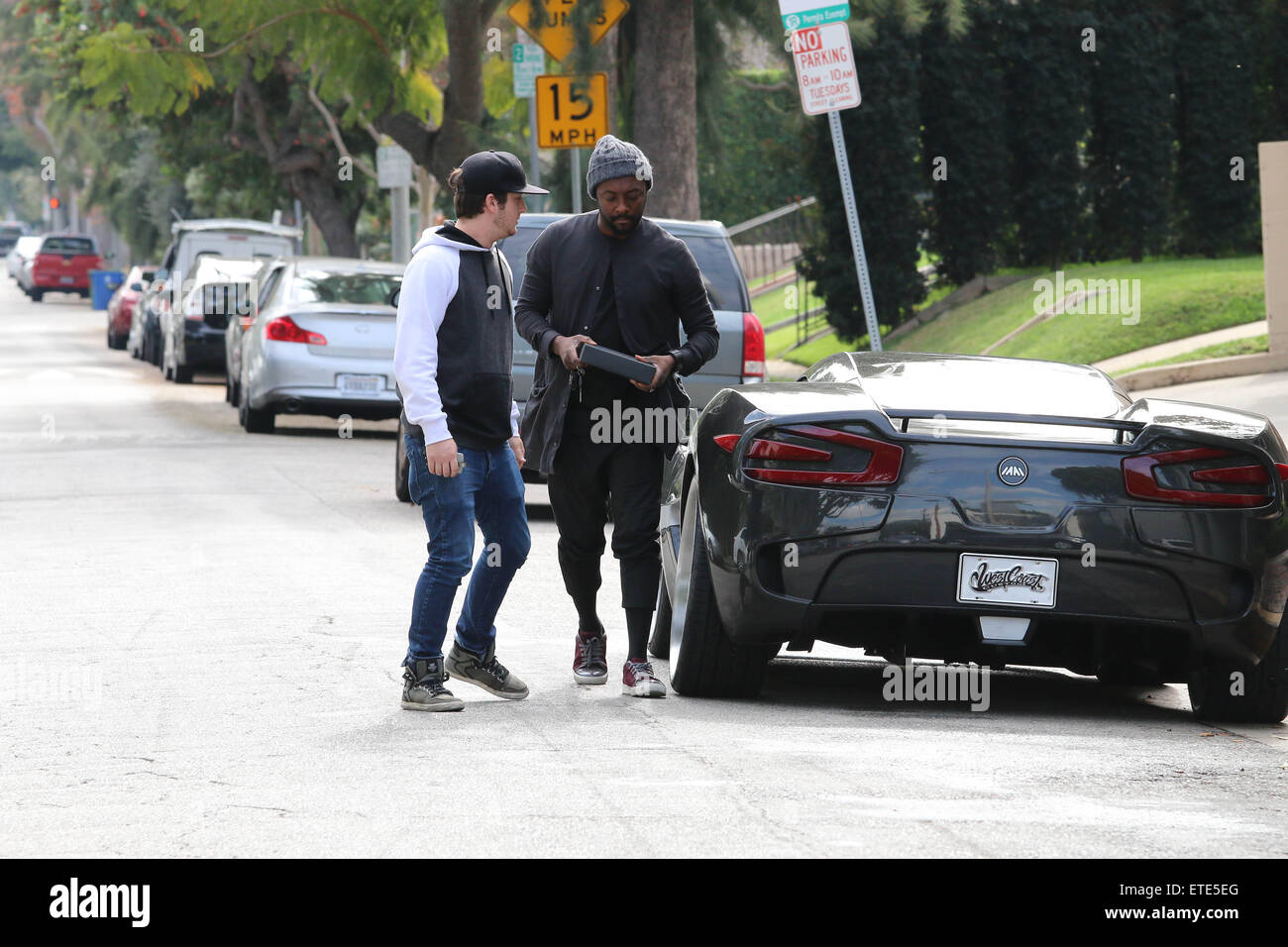 will.i.am arrives at Justin Bieber's office in Beverly Hills in a ...
