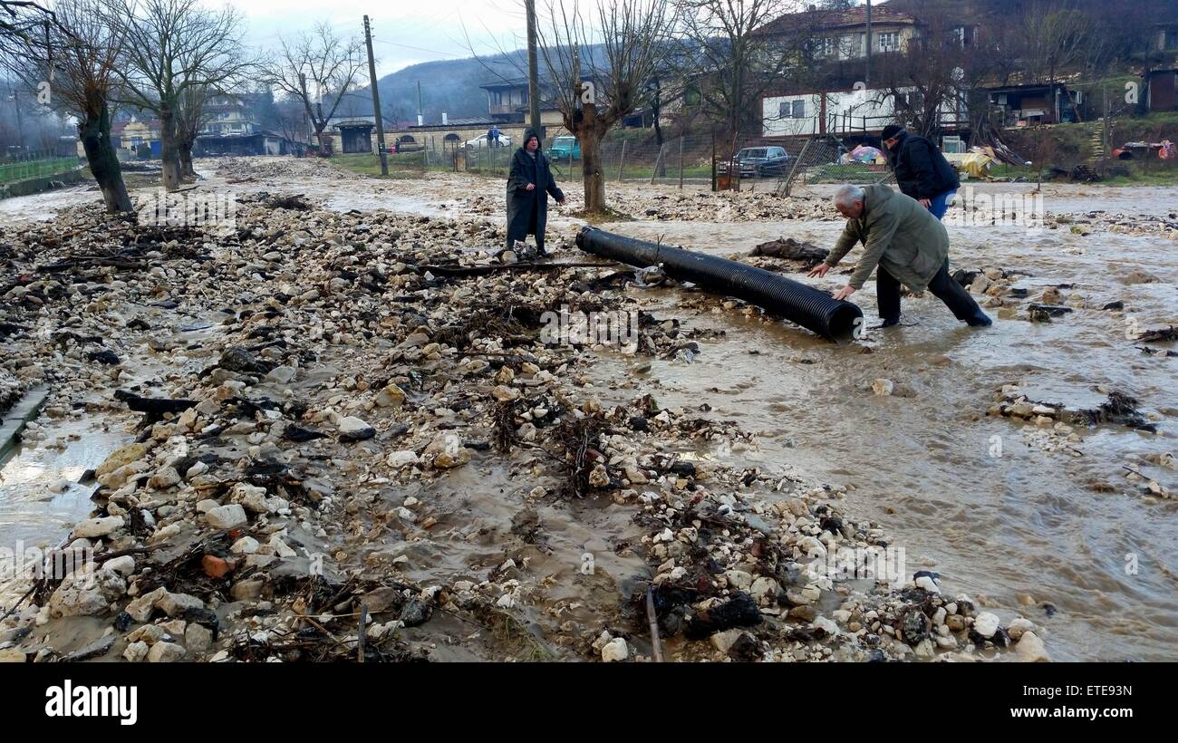 Heavy rain floods the streets of Doliste causing damage to homes and ...