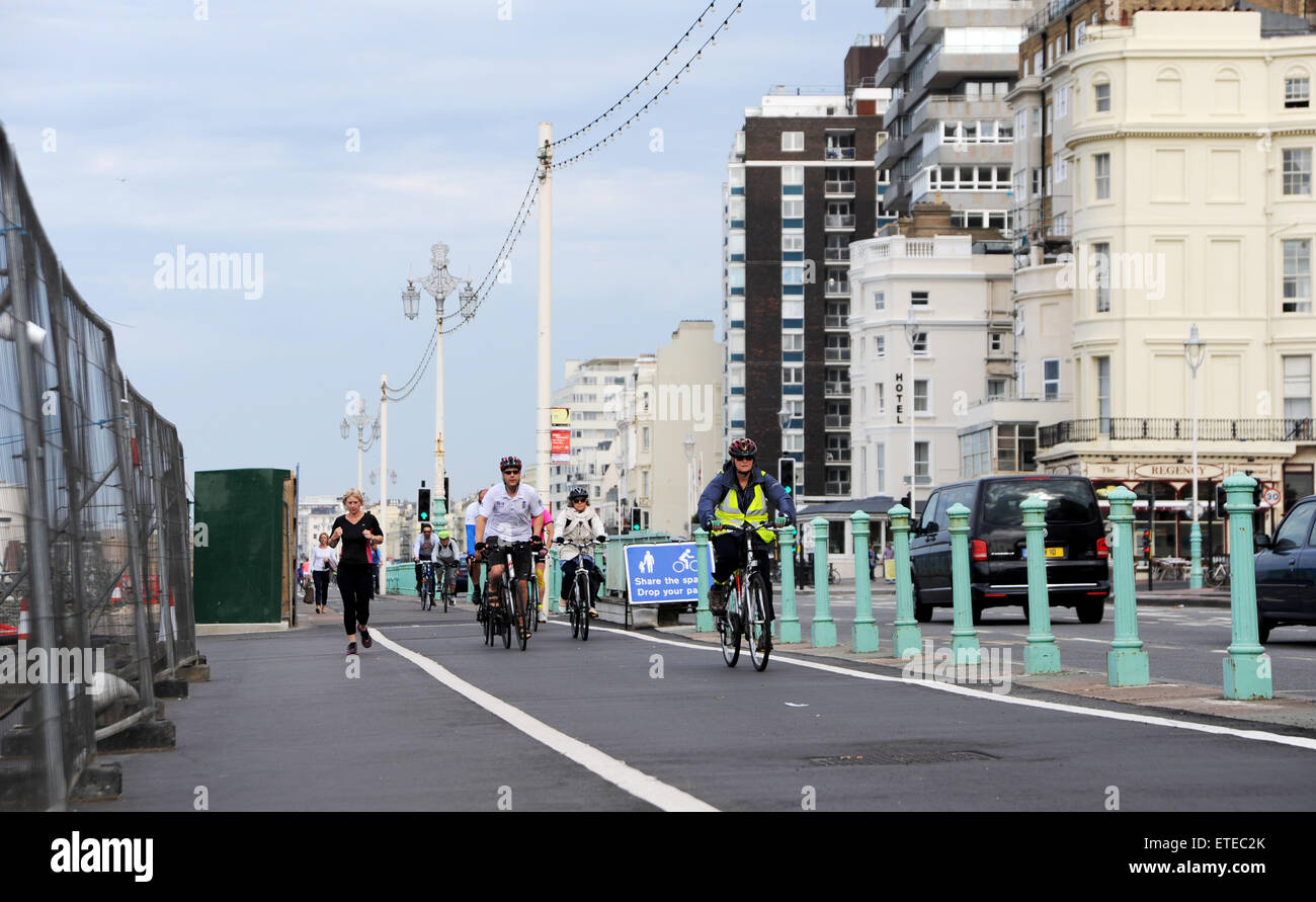 Cyclists in Cycle lane Brighton seafront UK Stock Photo - Alamy
