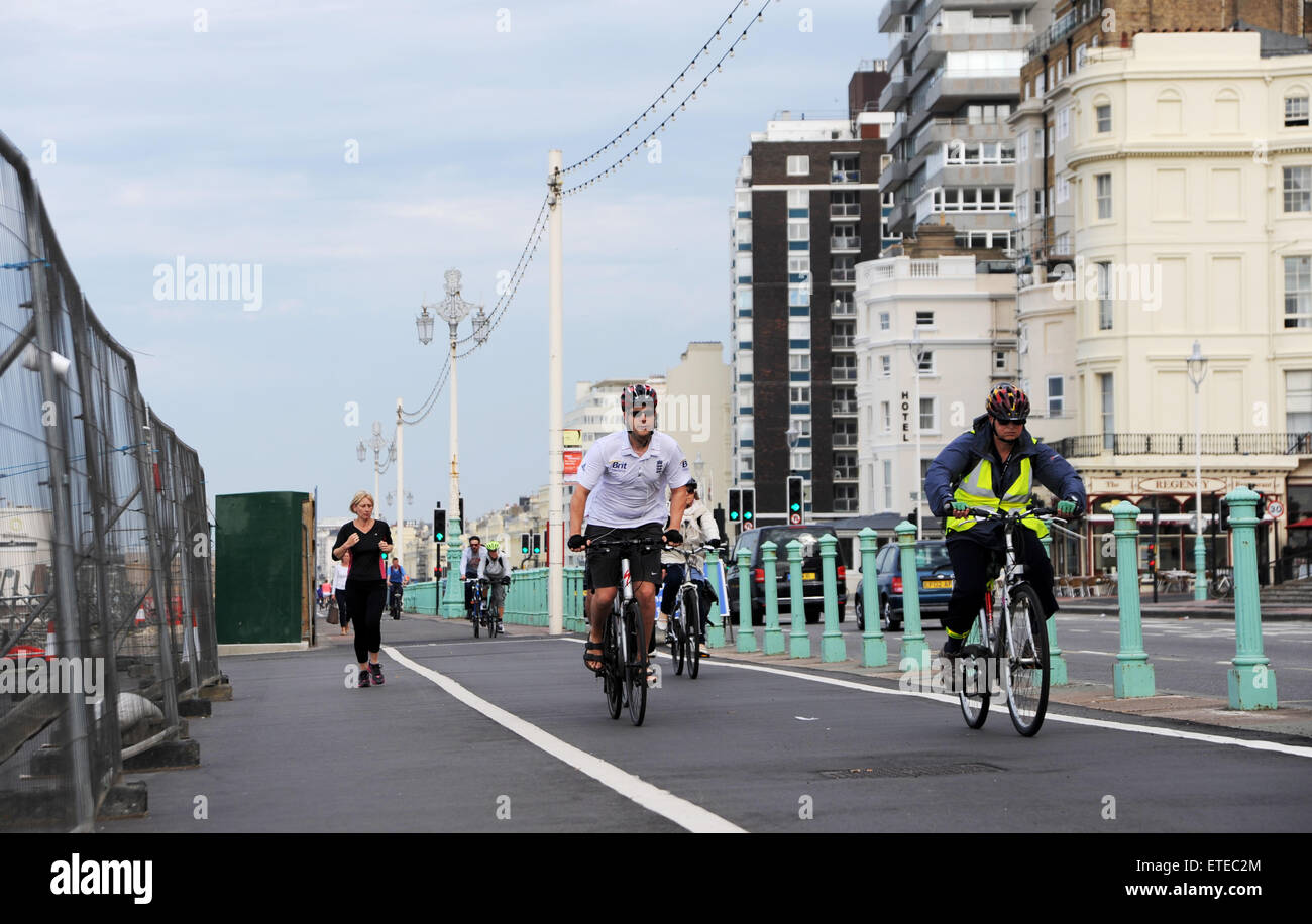 Cyclists in Cycle lane Brighton seafront UK Stock Photo - Alamy