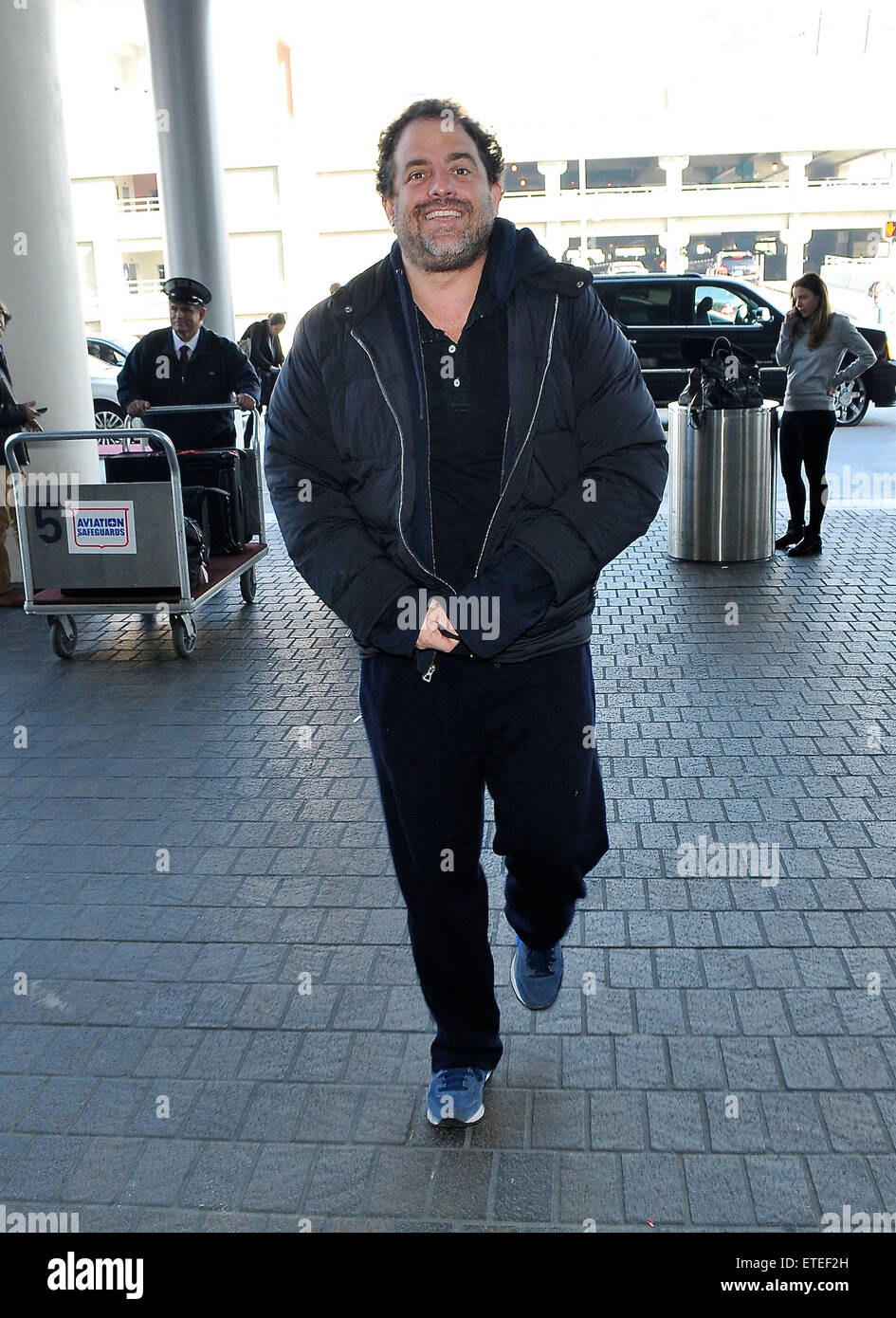 Brett Ratner arrives at LAX to catch an International flight out of Los ...